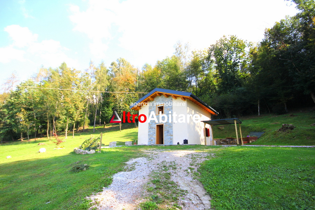 LIMANA. Rustico ristrutturato, pronto uso, con prato e bosco - Altroabitare